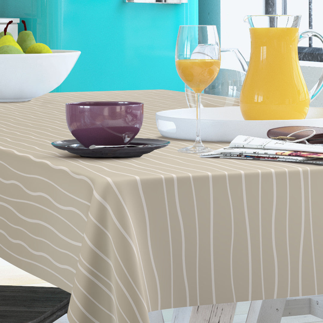 Fluvio Tan voksduk – Organisk design i varm beige – Se mer – Dukernorge